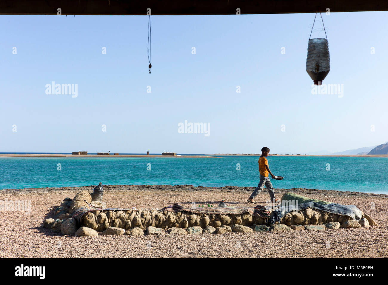 Sea, sandy beach, sand, Junde, boy, turquoise, blue Stock Photo - Alamy
