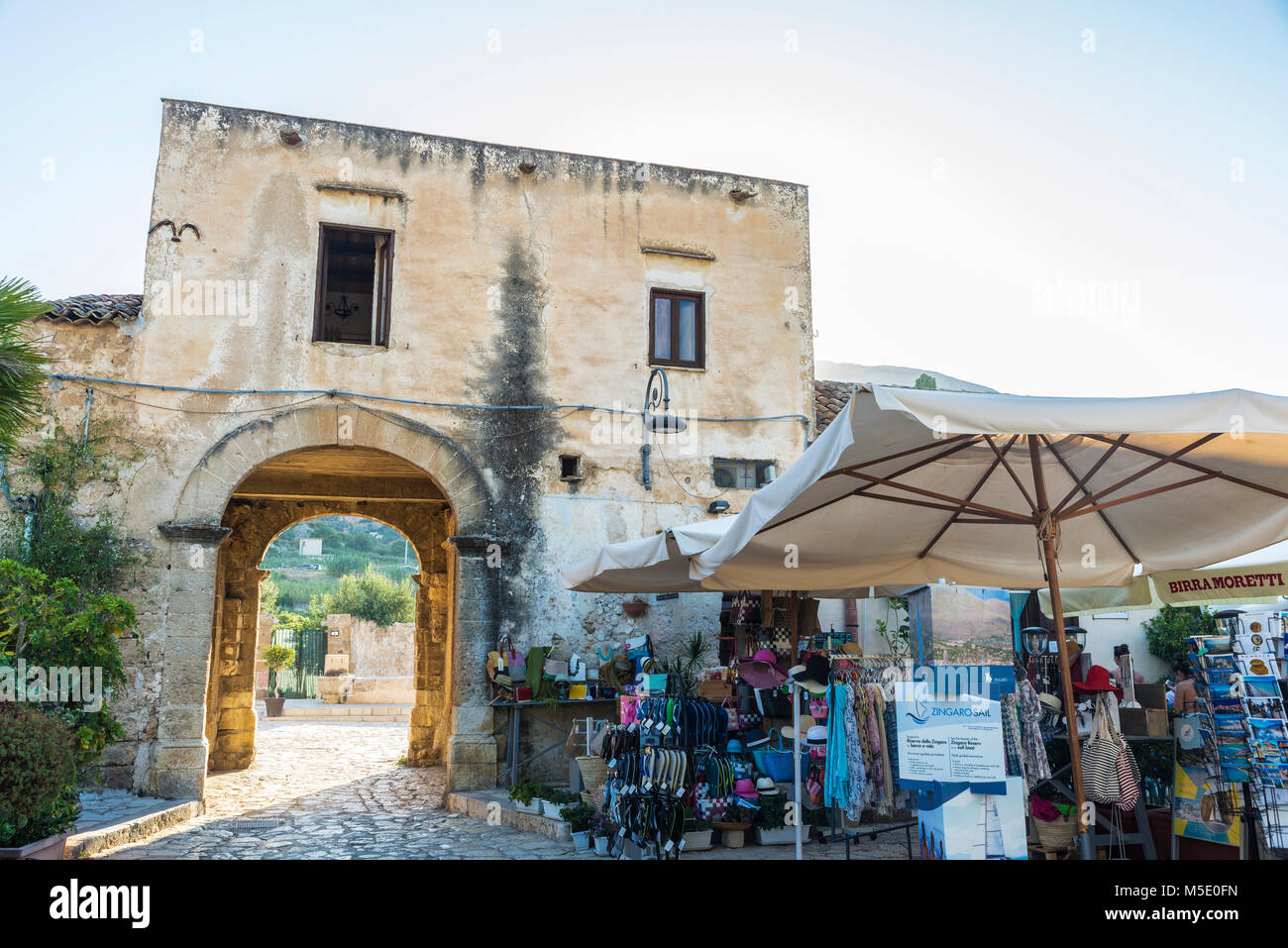 Scopello, Italy - August 7, 2017: Street in the old town with a ...