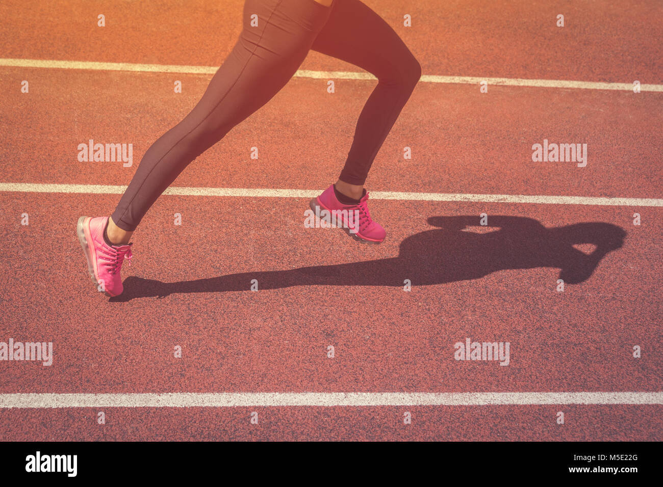 Girl athlete running in track hi-res stock photography and images - Alamy