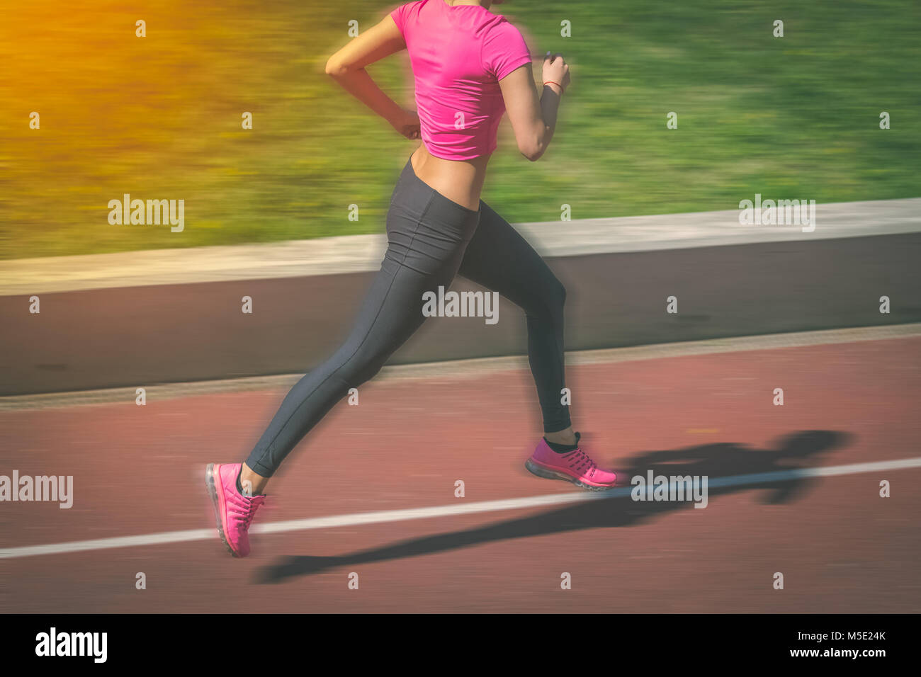 Female athletes training running track hi-res stock photography and ...