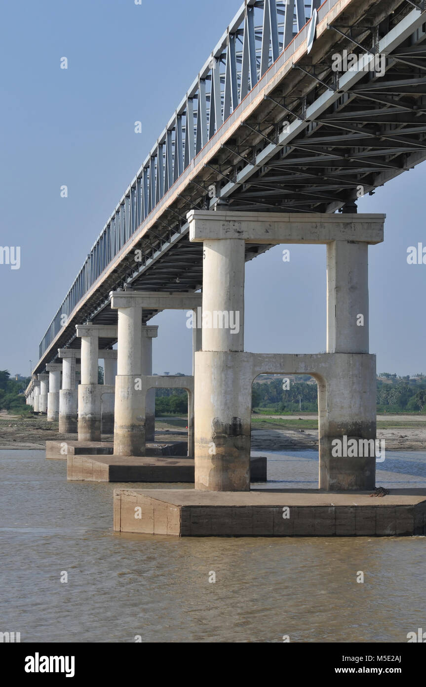 A view of a large modern bridge over the Irrawaddy River in Myanmar ...