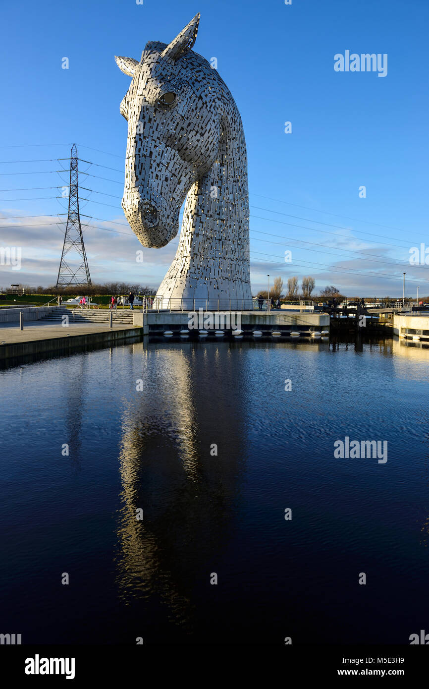 One of the Kelpie sculptures by Andy Scott reflected in the canal at ...
