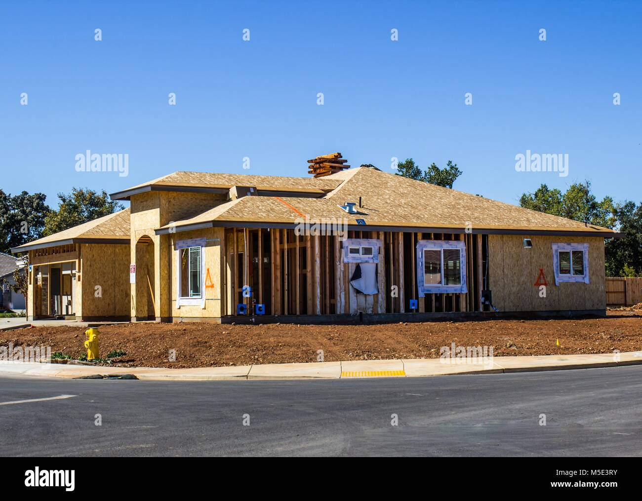 New Construction On Corner Home Stock Photo - Alamy