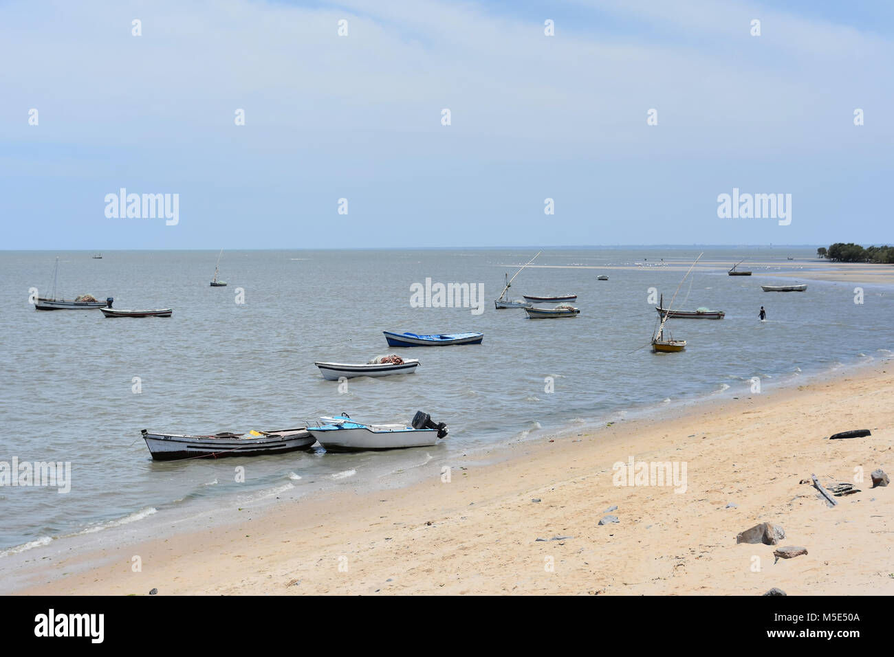 Boats of fishermen near the beach at the Indian Ocean near Maputo the ...