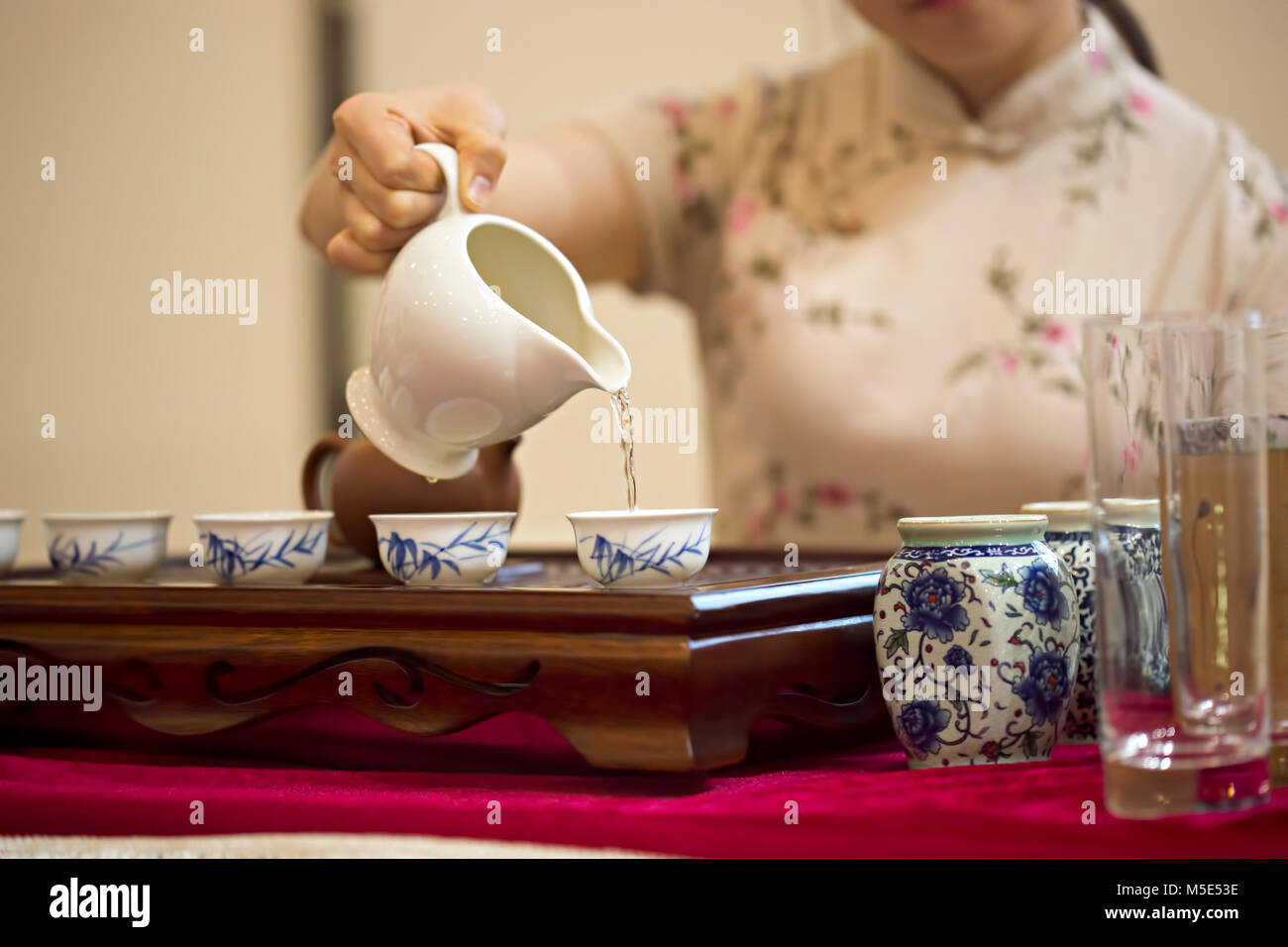 Chinese girl preparing tea Stock Photo - Alamy