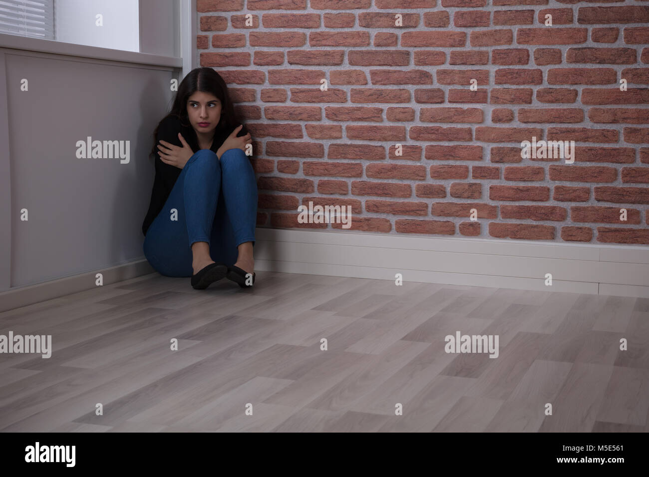 Person alone corner hi-res stock photography and images - Alamy