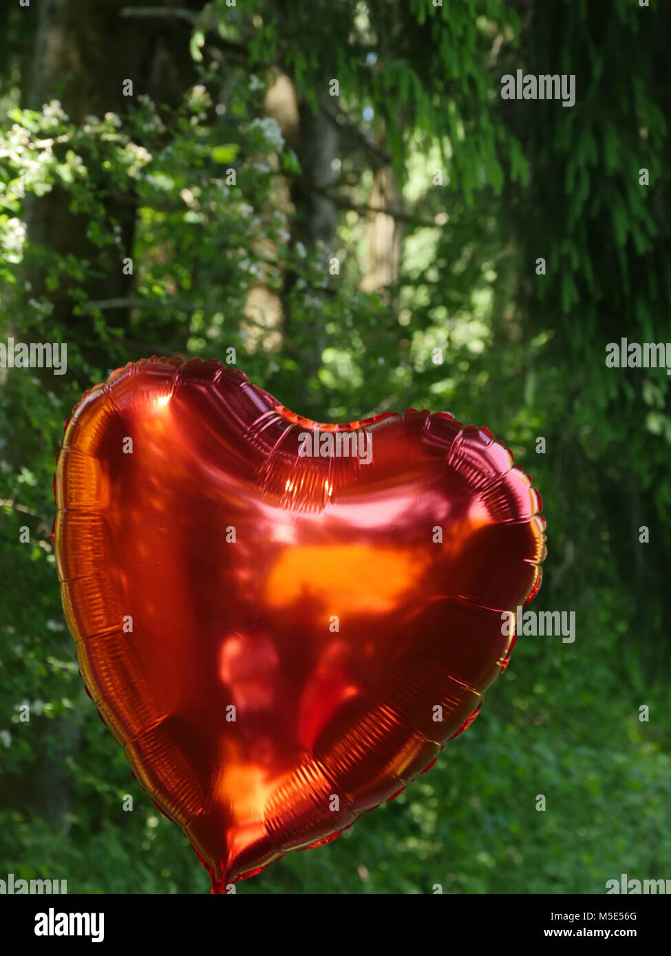 red heart balloon Stock Photo - Alamy