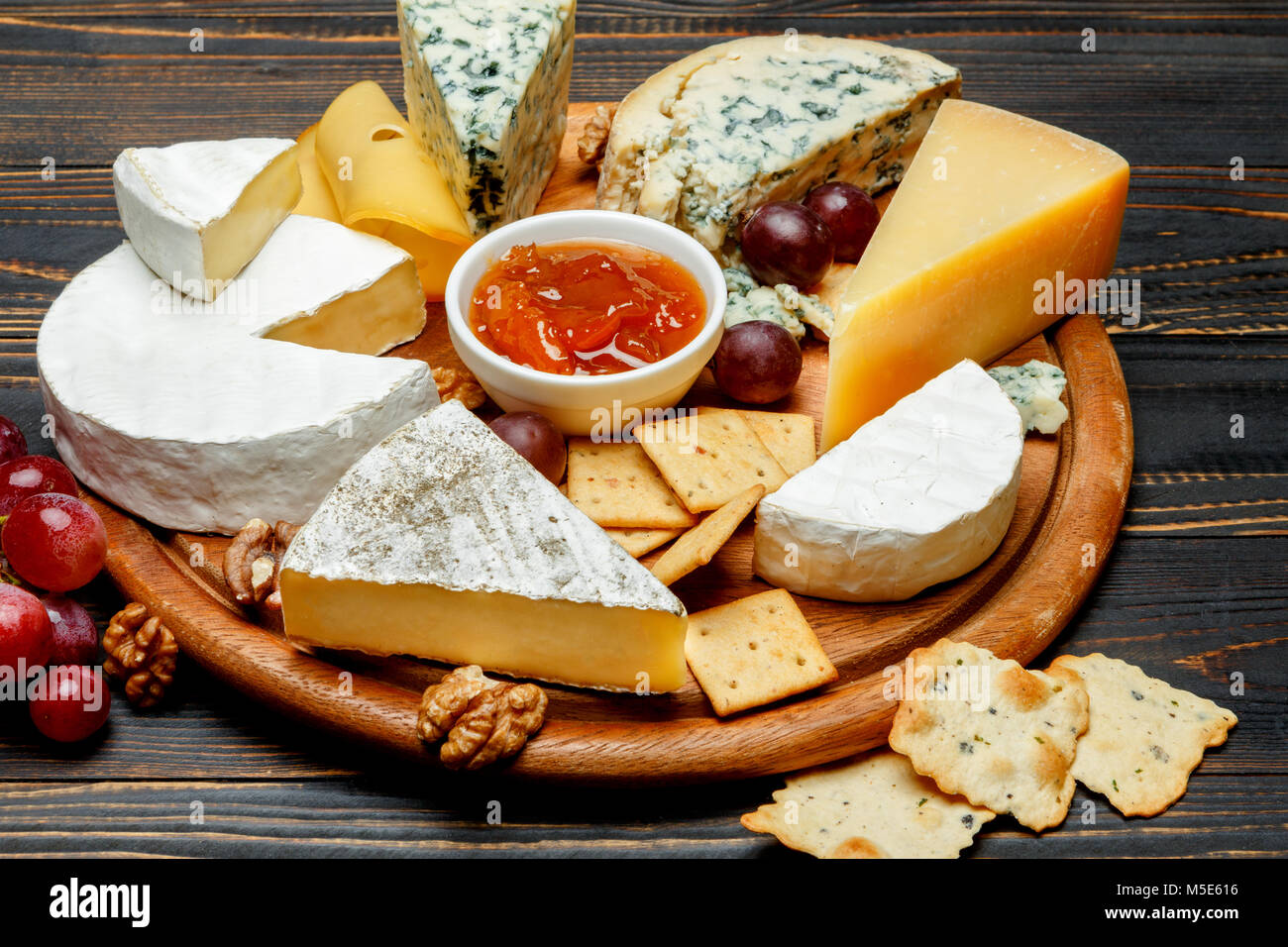 Various types of cheese - parmesan, brie, roquefort, cheddar Stock ...