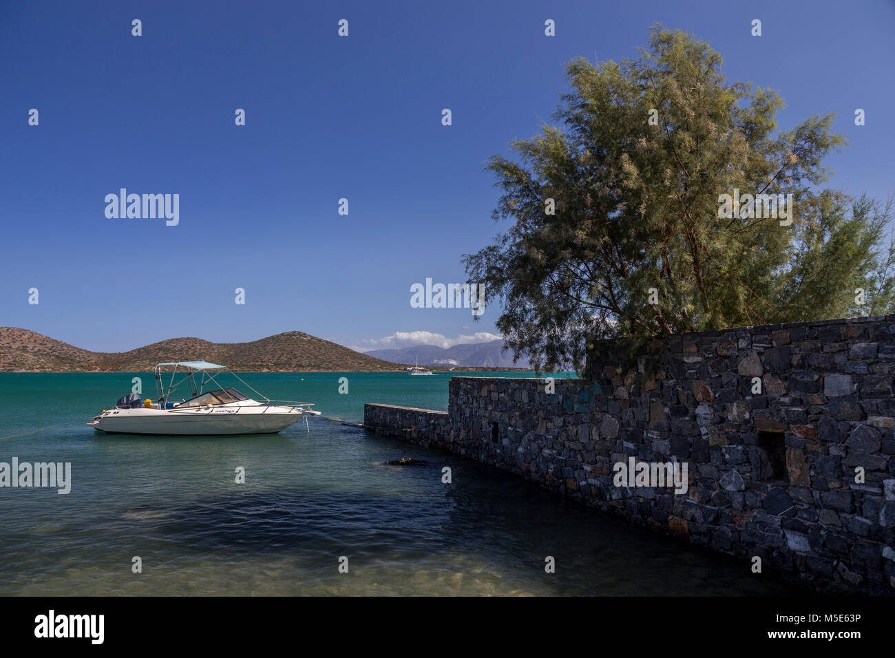 Boat moored at Elounda, Crete in the Mediterranean Sea Stock Photo - Alamy