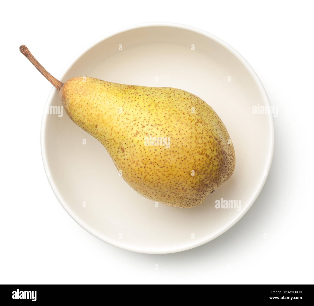 Pear in bowl isolated on white background. Abate fetel pear. Top view ...