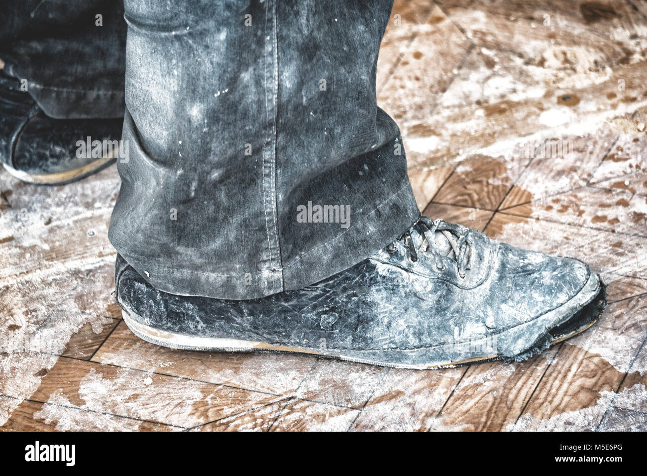 Old dirty ripped shoes Stock Photo - Alamy