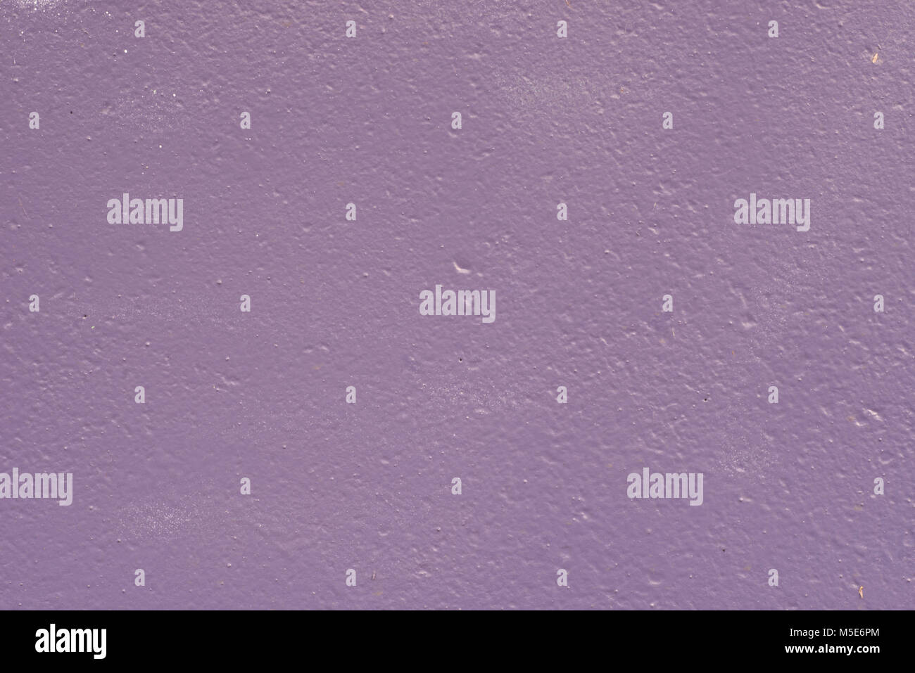 lila color painted wall texture bacground Stock Photo - Alamy
