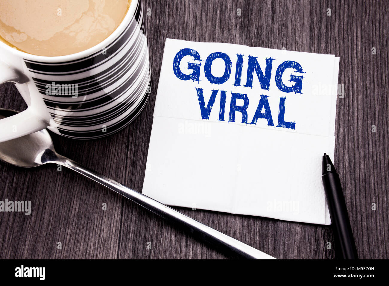 Handwritten text showing Going Viral. Business concept for Social Viral ...