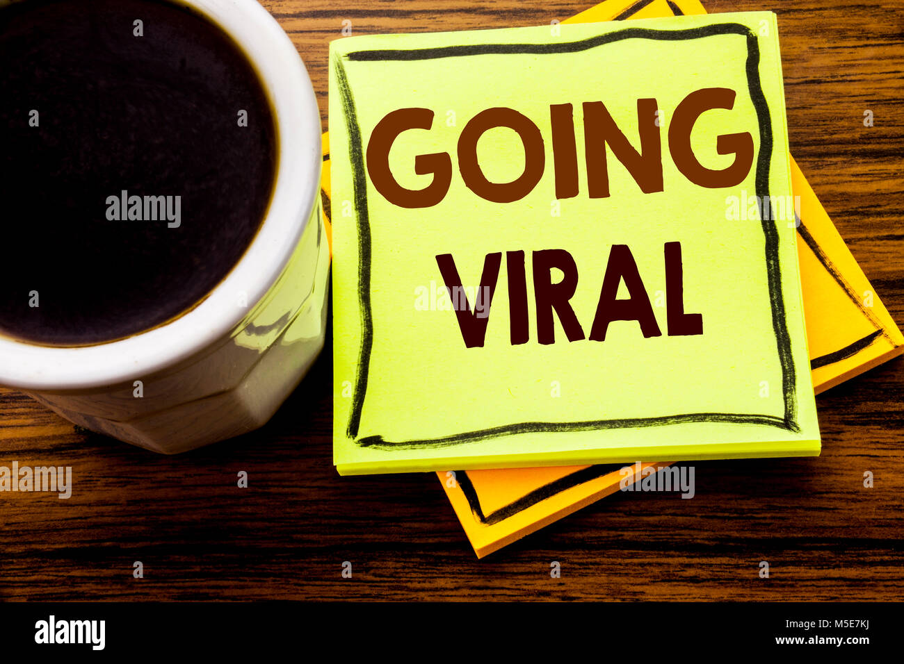 Handwritten text showing Going Viral. Business concept for Social Viral ...