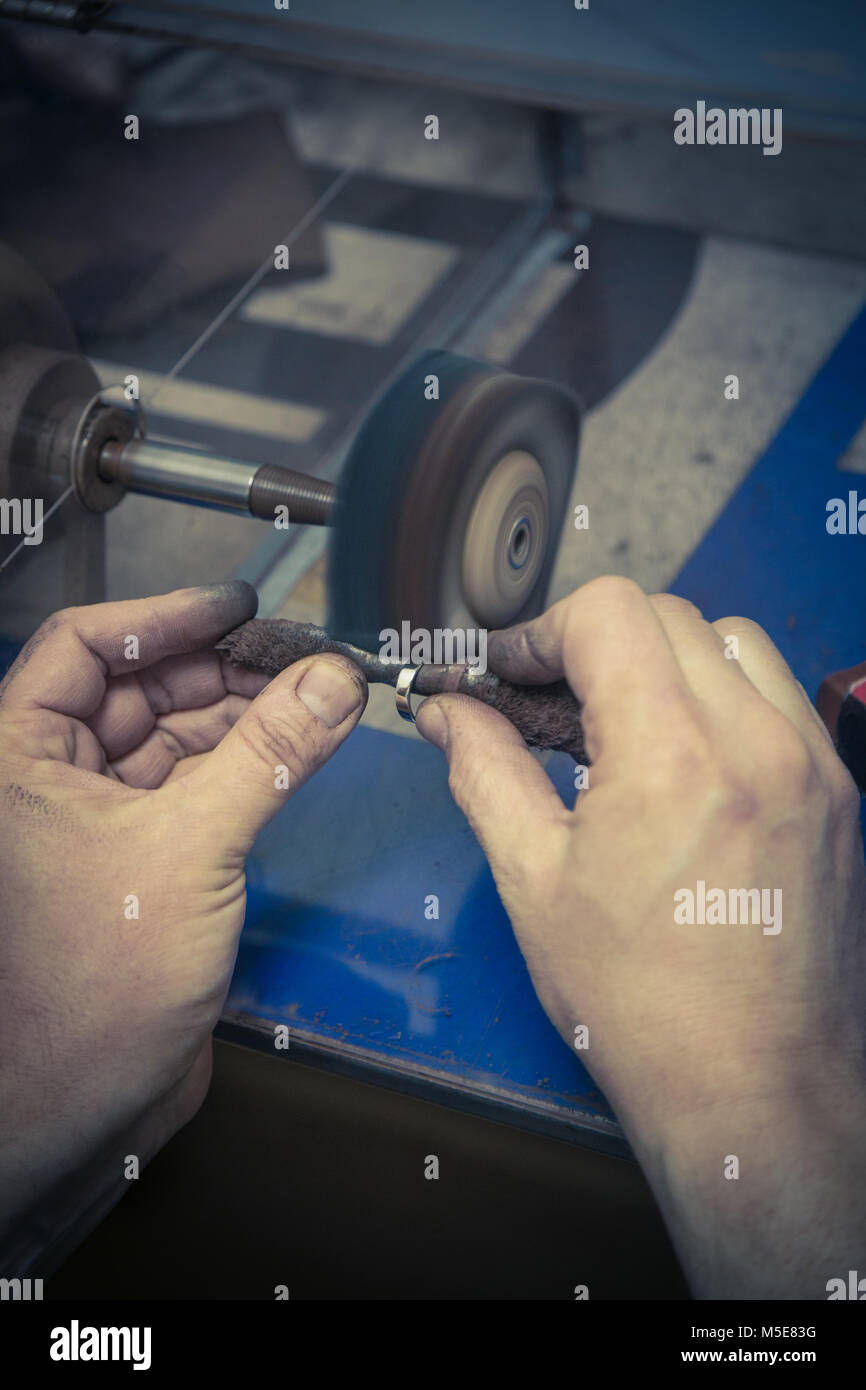 Jeweler polishing handmade craft jewelry hi-res stock photography and ...