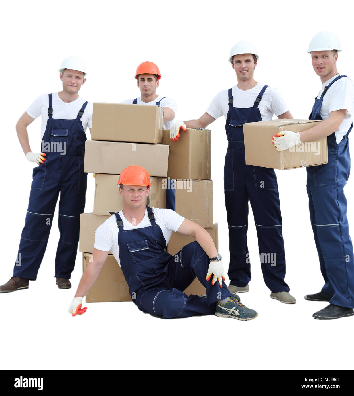 Group of people builders with boxes Stock Photo - Alamy