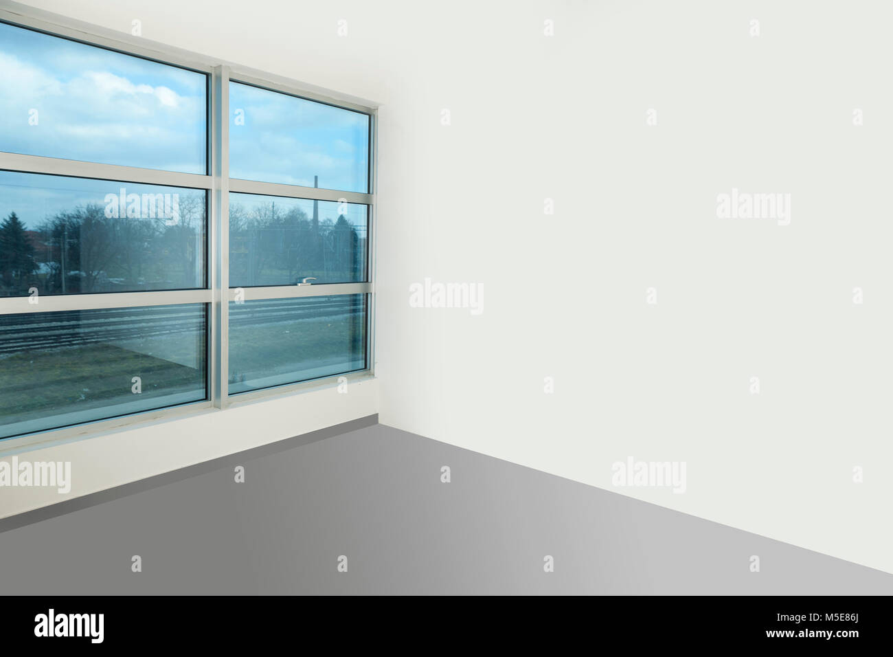 empty space with white wall and windows Stock Photo - Alamy