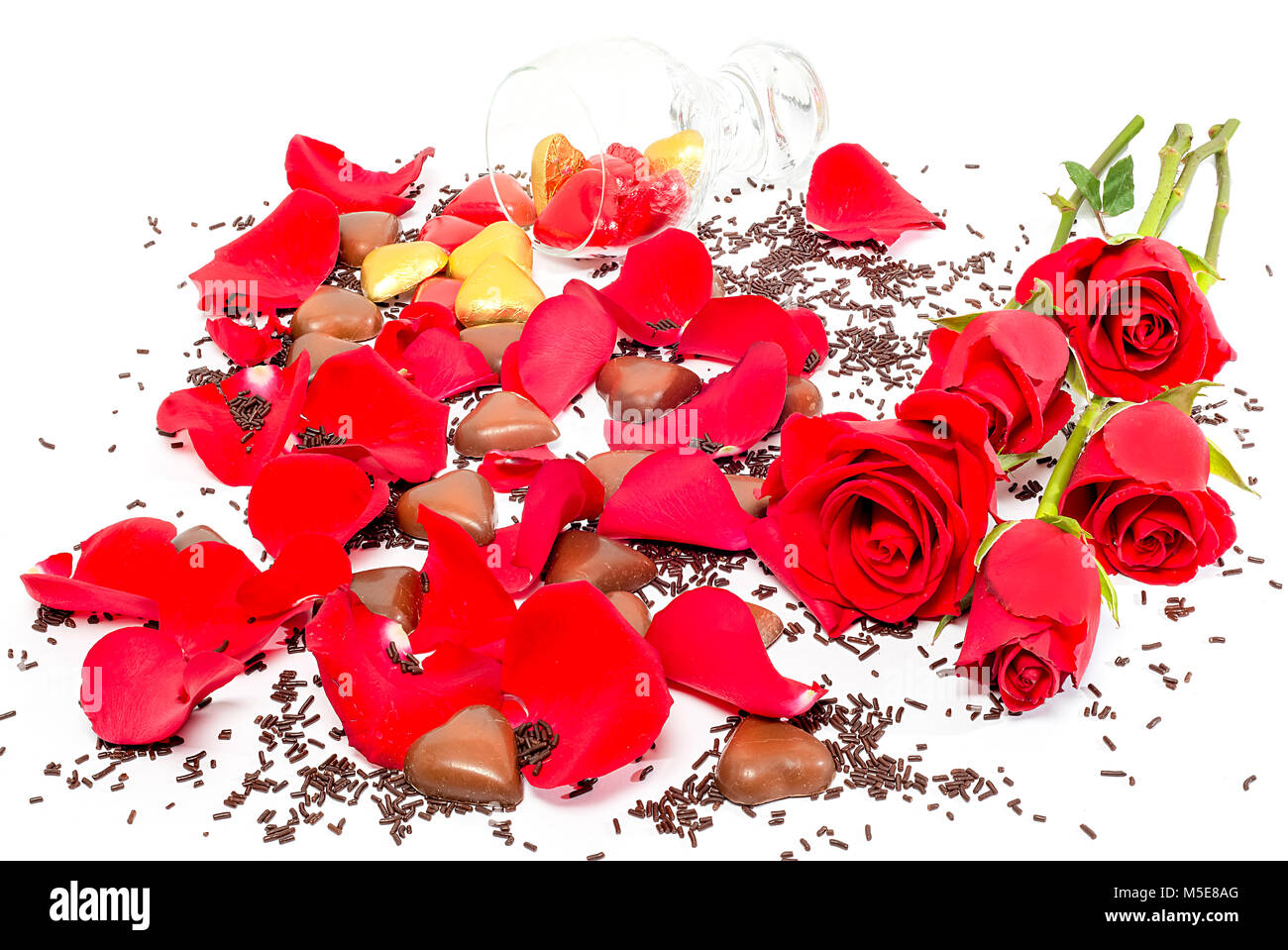 Roses and chocolate hearts on white background Stock Photo - Alamy