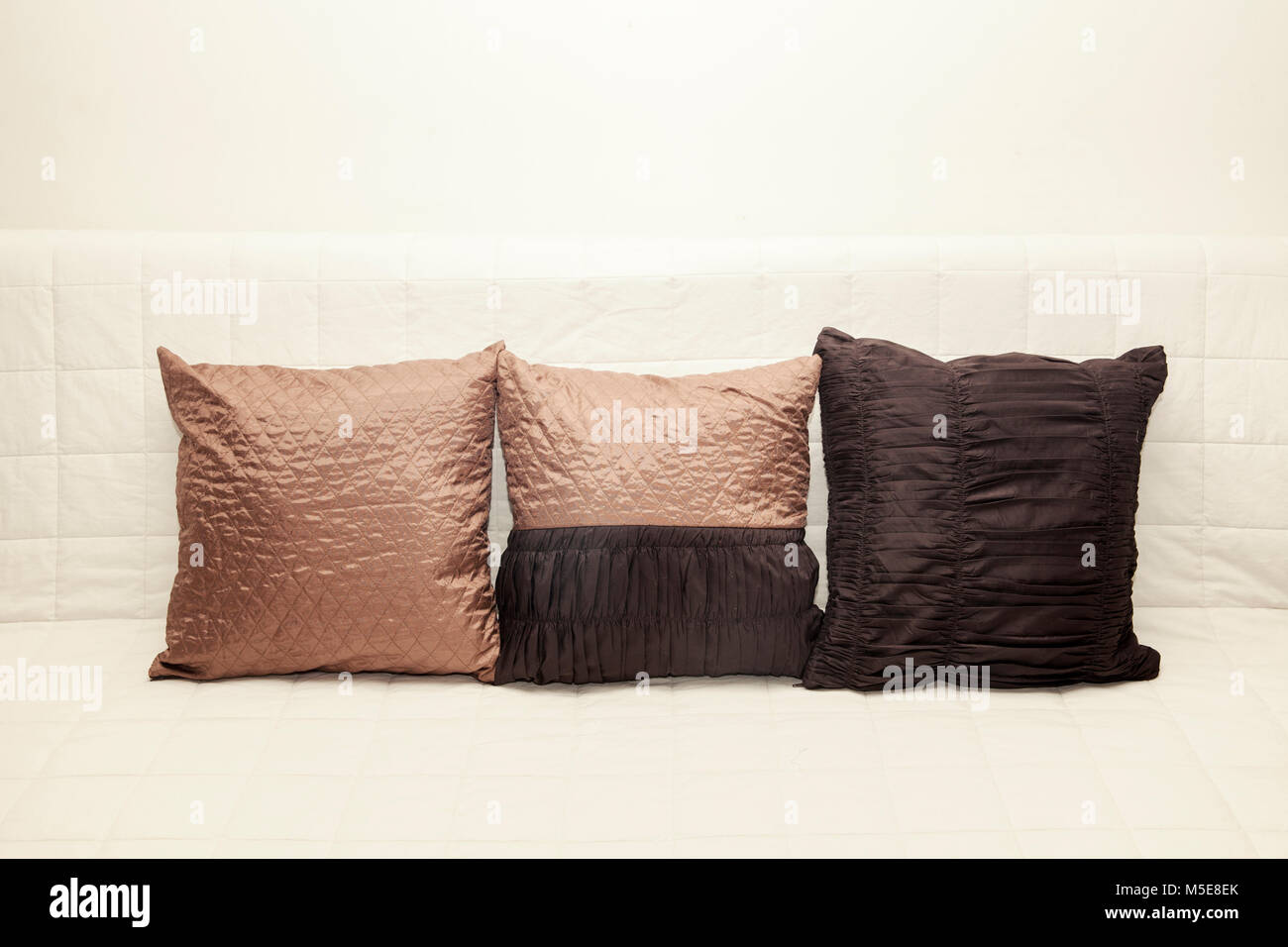 decorative small pillow on the bed, close up Stock Photo - Alamy