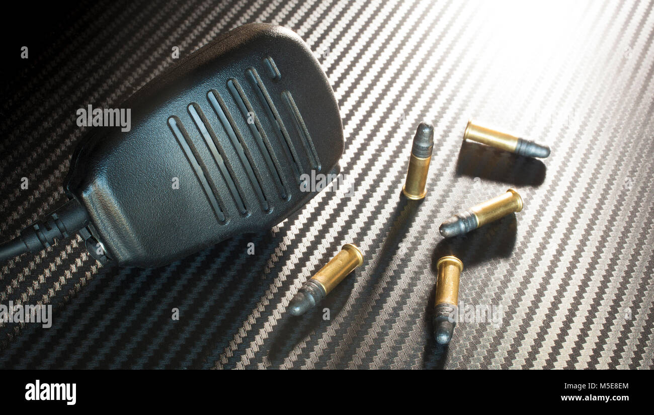 Police microphone with five rim fire catridges Stock Photo - Alamy
