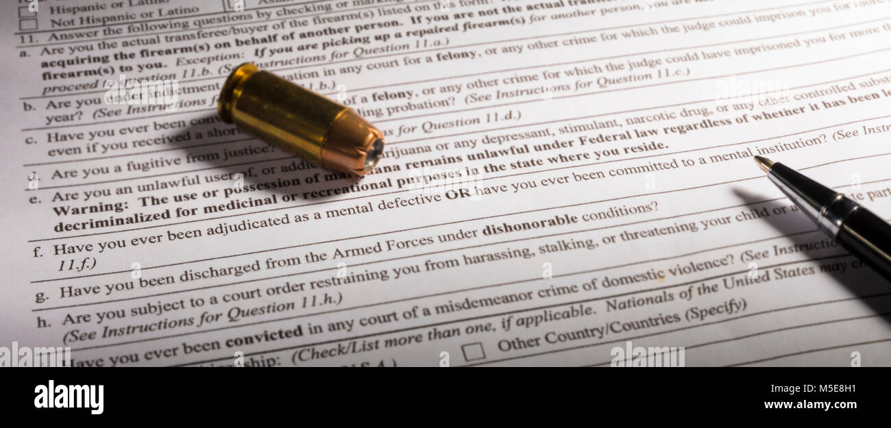 Ammo and a pen near the mental health question on the gun purchase ...