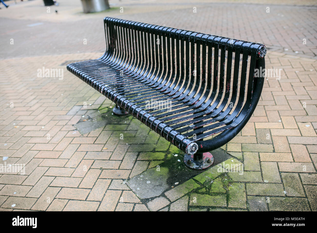 Black bench on the street Stock Photo - Alamy
