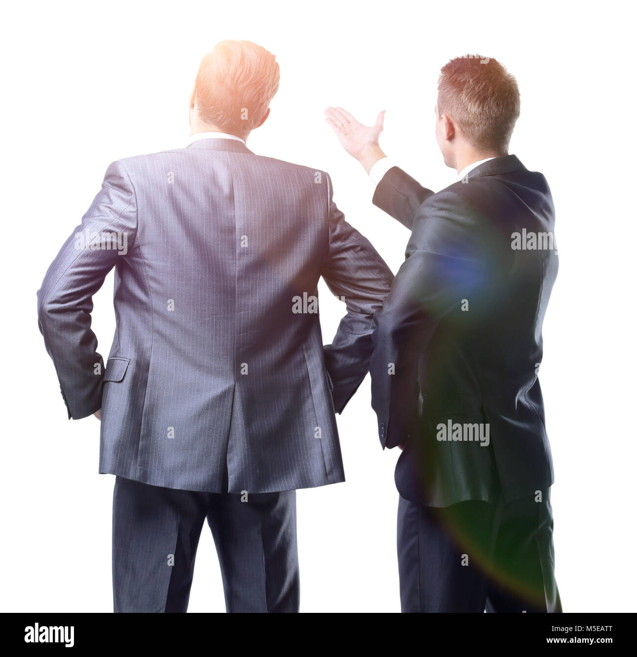 rear view of two businessmen pointing forward Stock Photo - Alamy