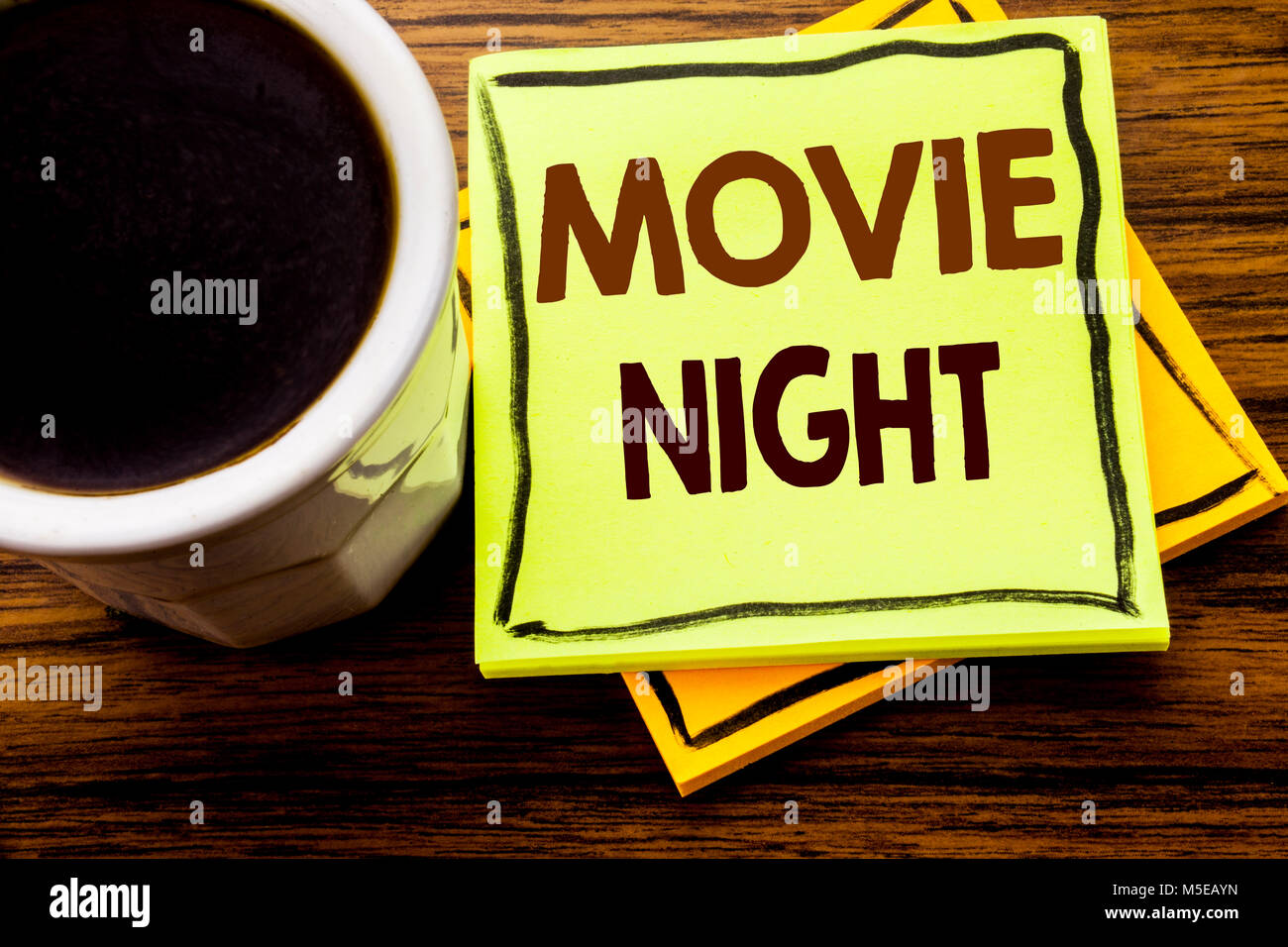 Handwritten text showing Movie Night. Business concept for Wathing ...
