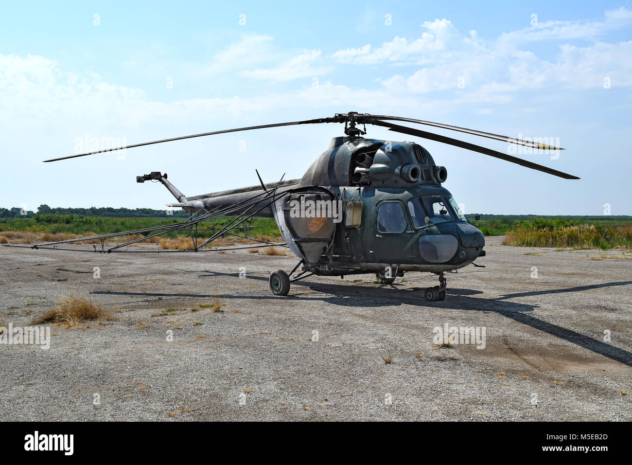 Old helicopter spraying fields Stock Photo - Alamy