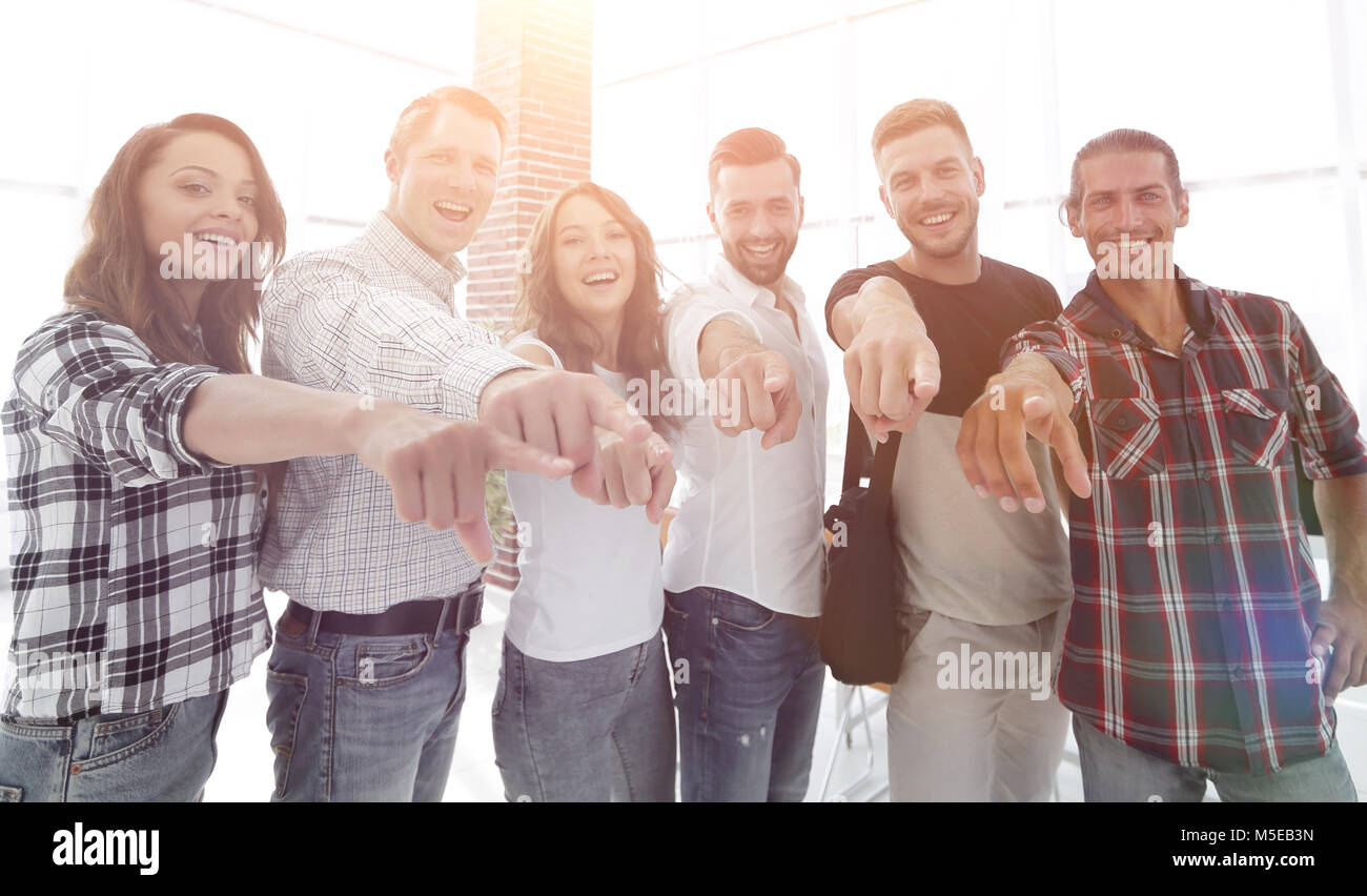 young professionals, pointing his arms forward Stock Photo - Alamy
