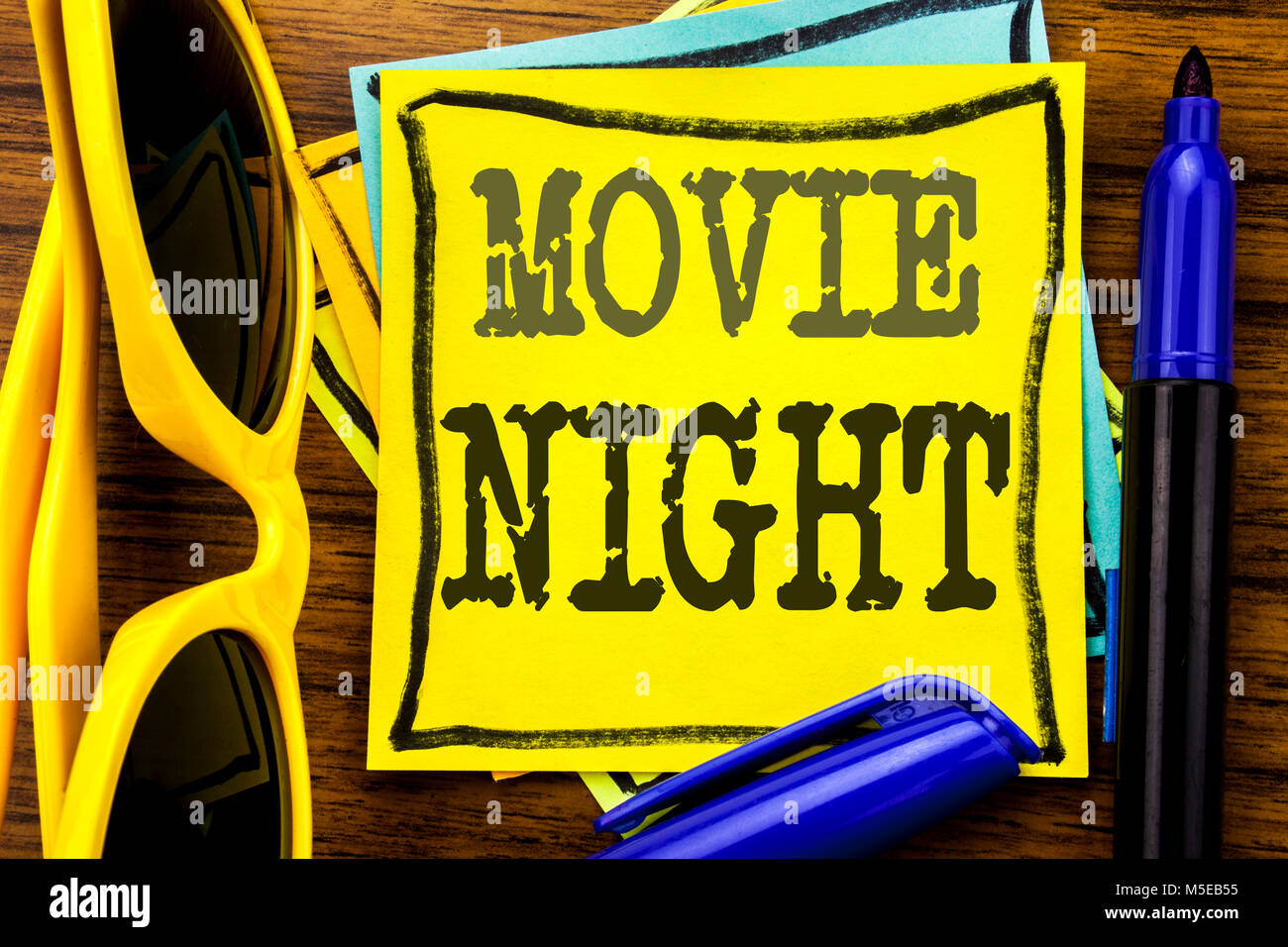 Hand writing text caption inspiration showing Movie Night. Business ...