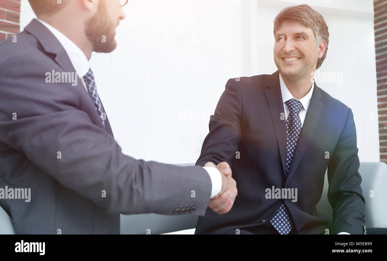 Handshake manager and attorney in the office Stock Photo - Alamy