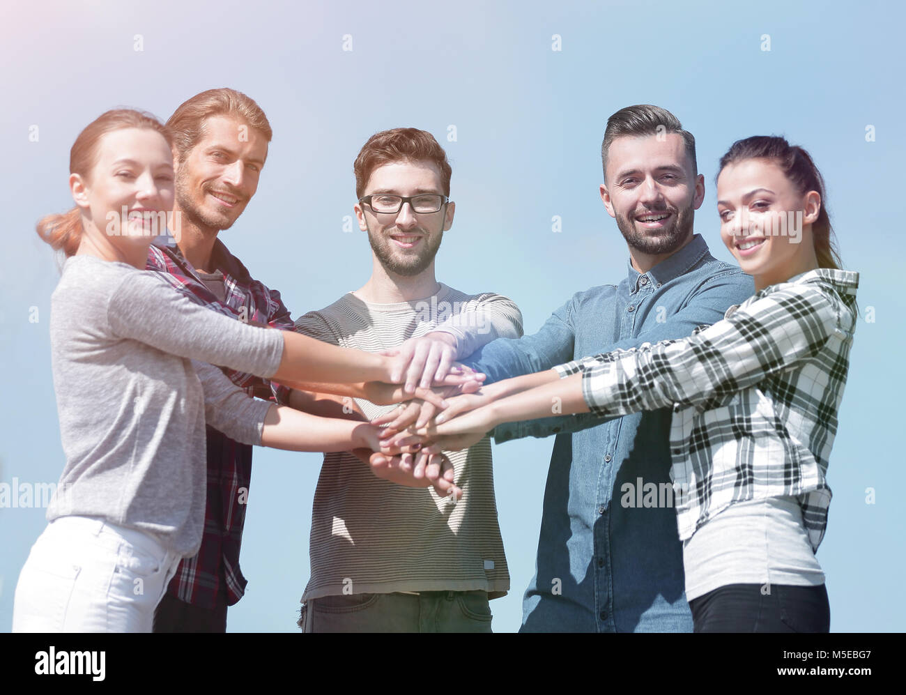 group of young people shows their unity Stock Photo - Alamy