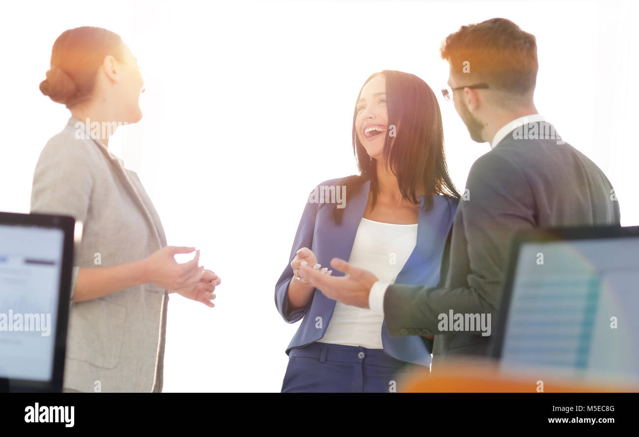 friendly business team having discussion in office Stock Photo - Alamy