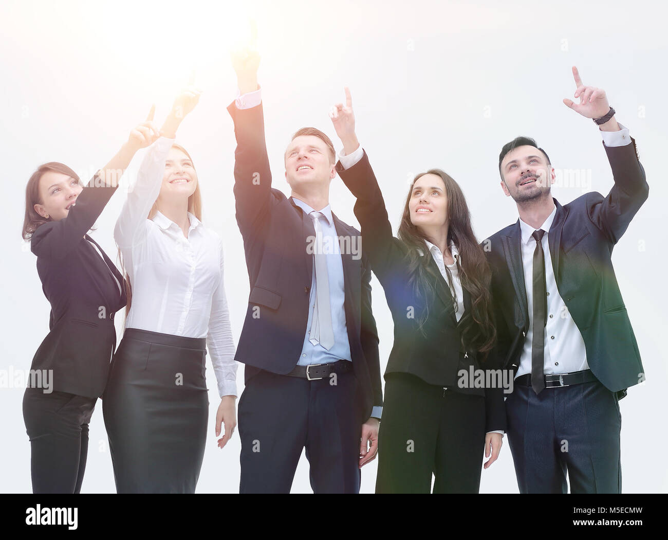 business team pointing hands forward Stock Photo - Alamy