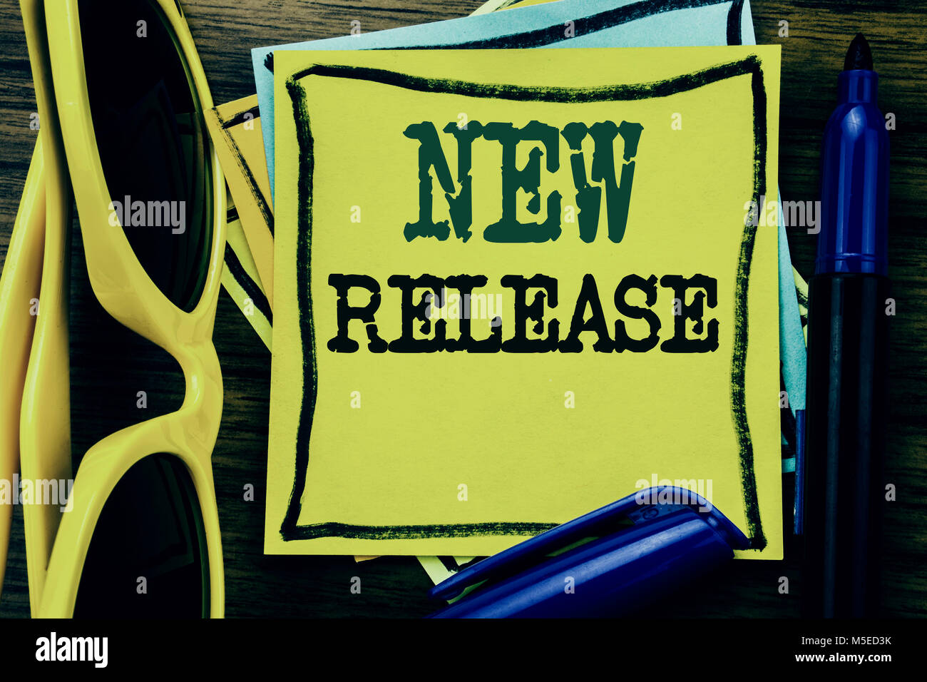 Hand writing text caption inspiration showing New Release . Business ...