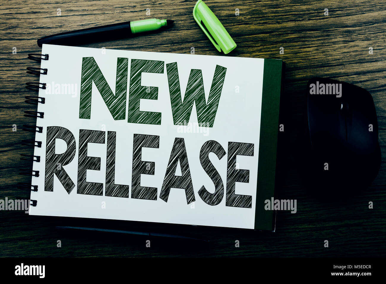 Handwriting Announcement text showing New Release . Business concept ...