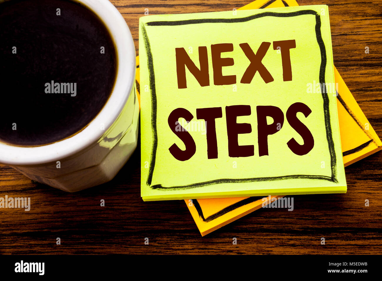 Handwritten text showing Next Steps. Business concept for Future Golas ...