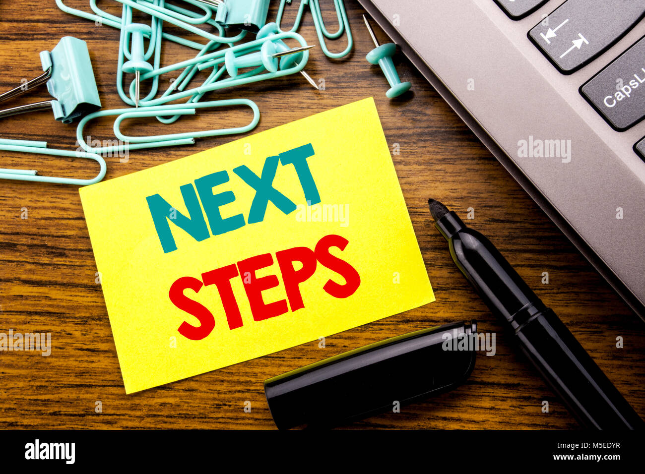 Handwriting Announcement text showing Next Steps. Business concept for ...