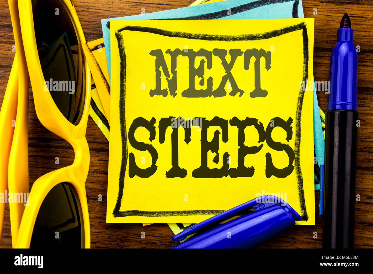 Hand writing text caption inspiration showing Next Steps. Business ...