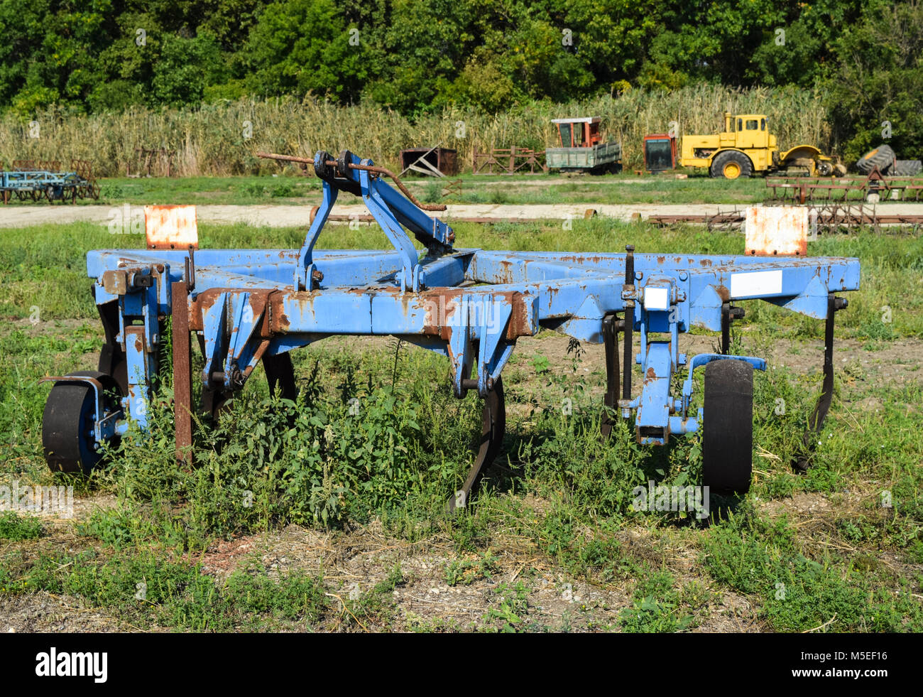 Plow on trailer for tractor. Plow for plowing soil. Trailer Hitch for ...