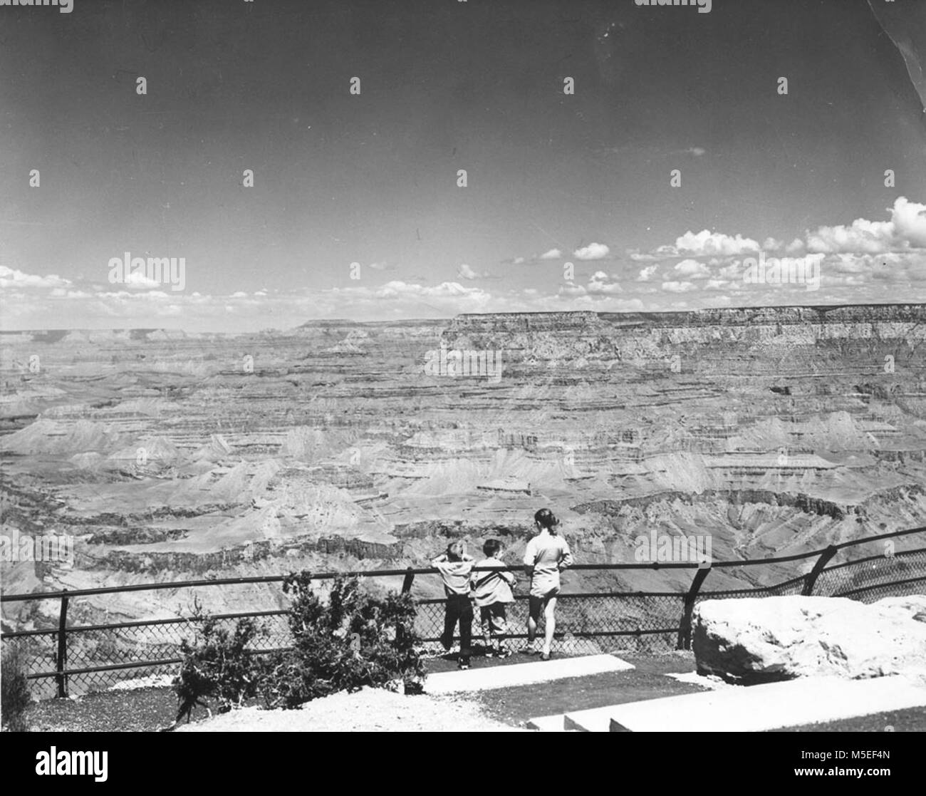 Grand Canyon Hopi Point FAMILY OF THREE VIEWING THE CANYON FROM HOPI ...