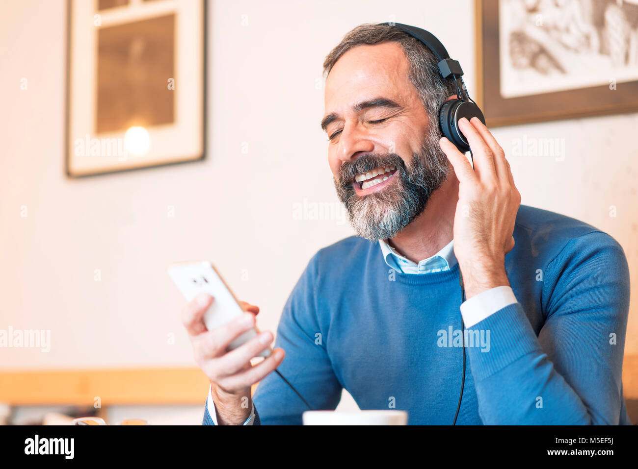 Cheerful old man enjoying music hi-res stock photography and images - Alamy