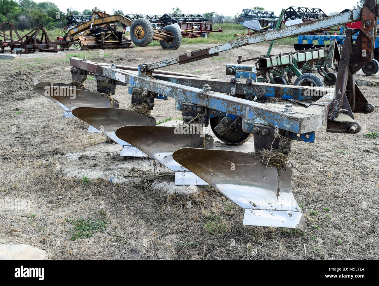 Plow on trailer for tractor. Plow for plowing soil. Trailer Hitch for ...