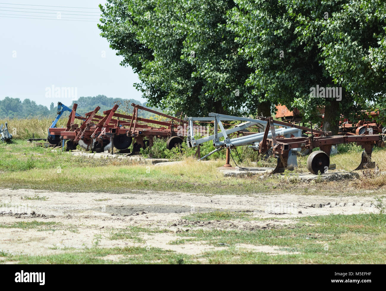 Plow on trailer for tractor. Plow for plowing soil. Trailer Hitch for ...