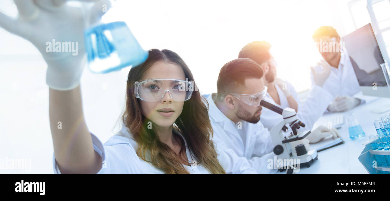 group of creative scientists working in a laboratory Stock Photo - Alamy