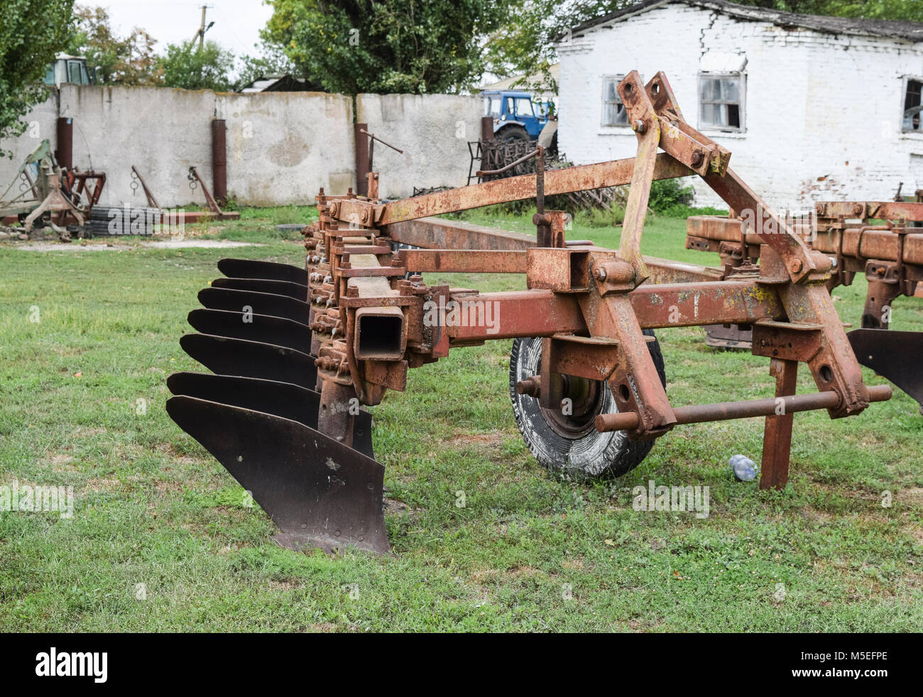 Plow on trailer for tractor. Plow for plowing soil. Trailer Hitch for ...