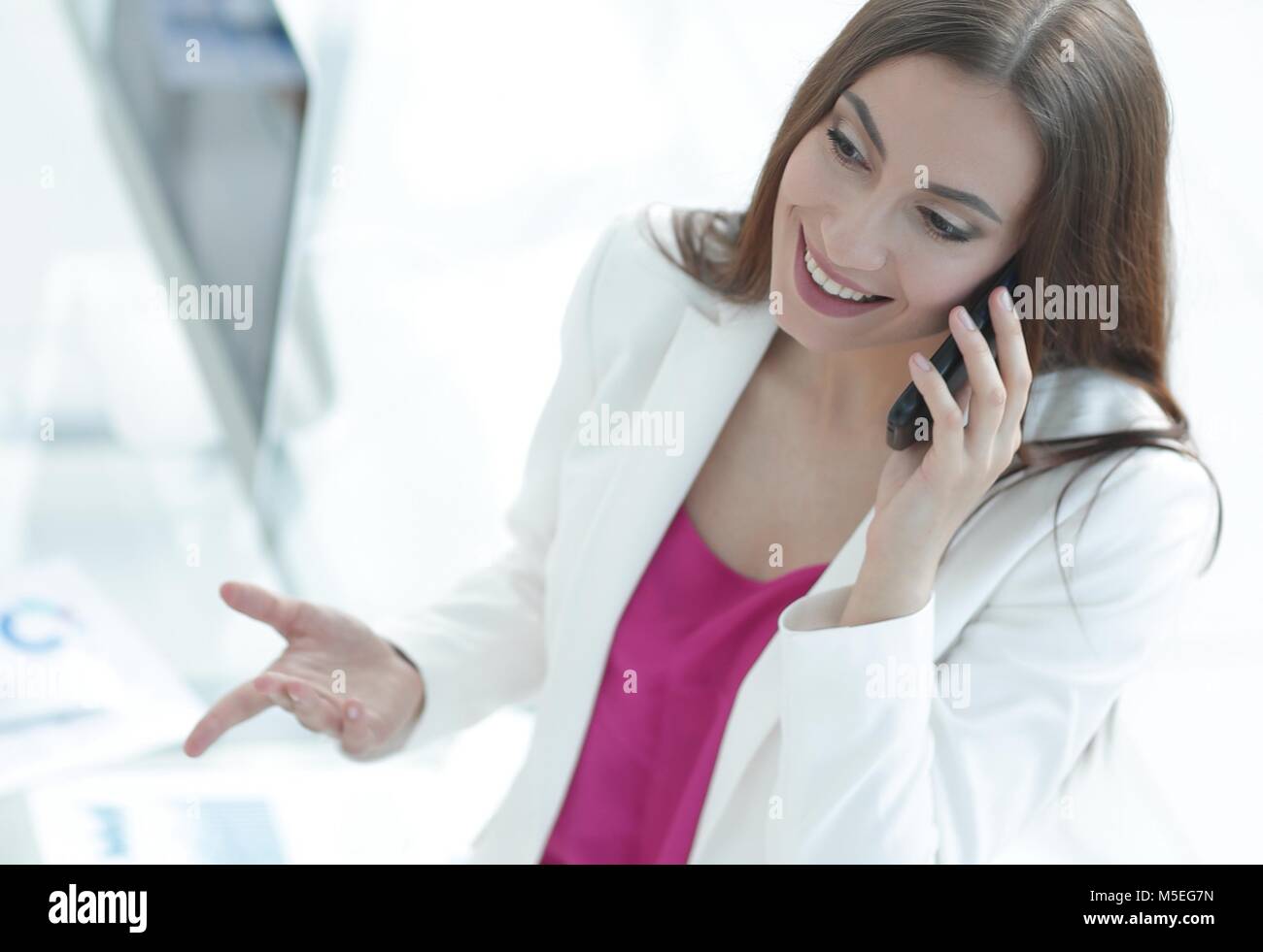 female Manager talking on the phone Stock Photo - Alamy