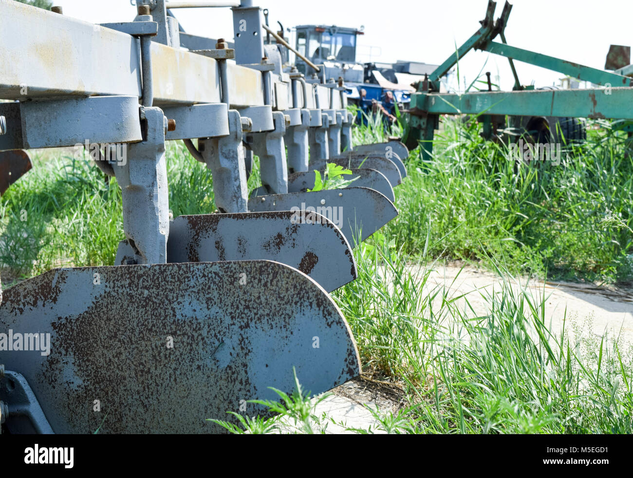 Plow on trailer for tractor. Plow for plowing soil. Trailer Hitch for ...