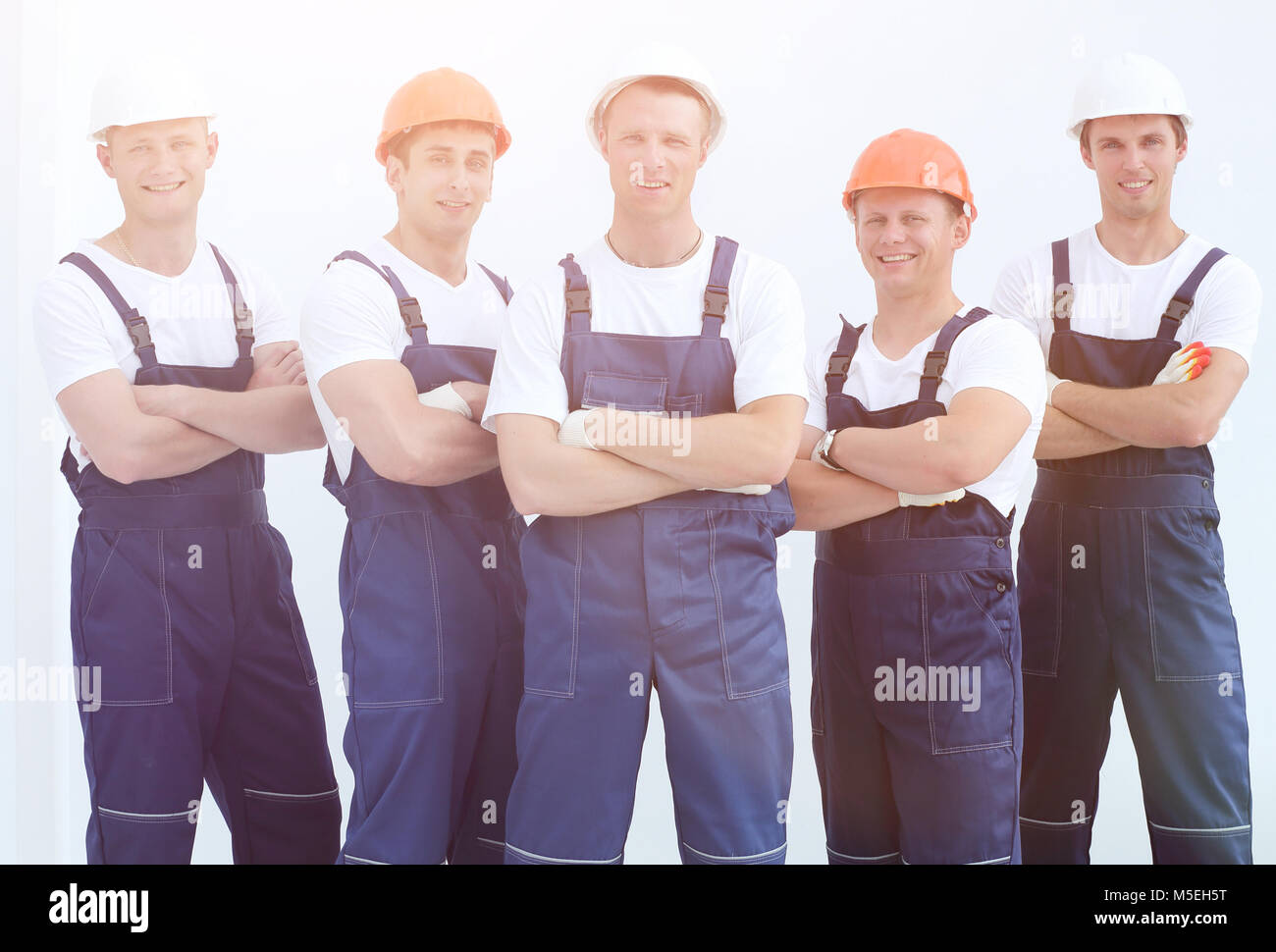 Group of professional industrial workers Stock Photo - Alamy